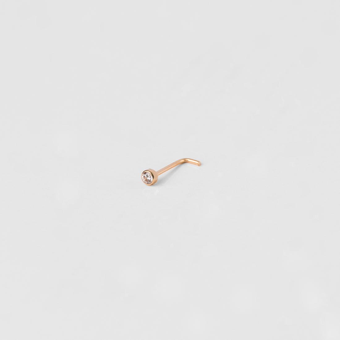 Piercing Nostril en Oro Rosado 18K con Circón – JOYERÍA SEBASTIÁN